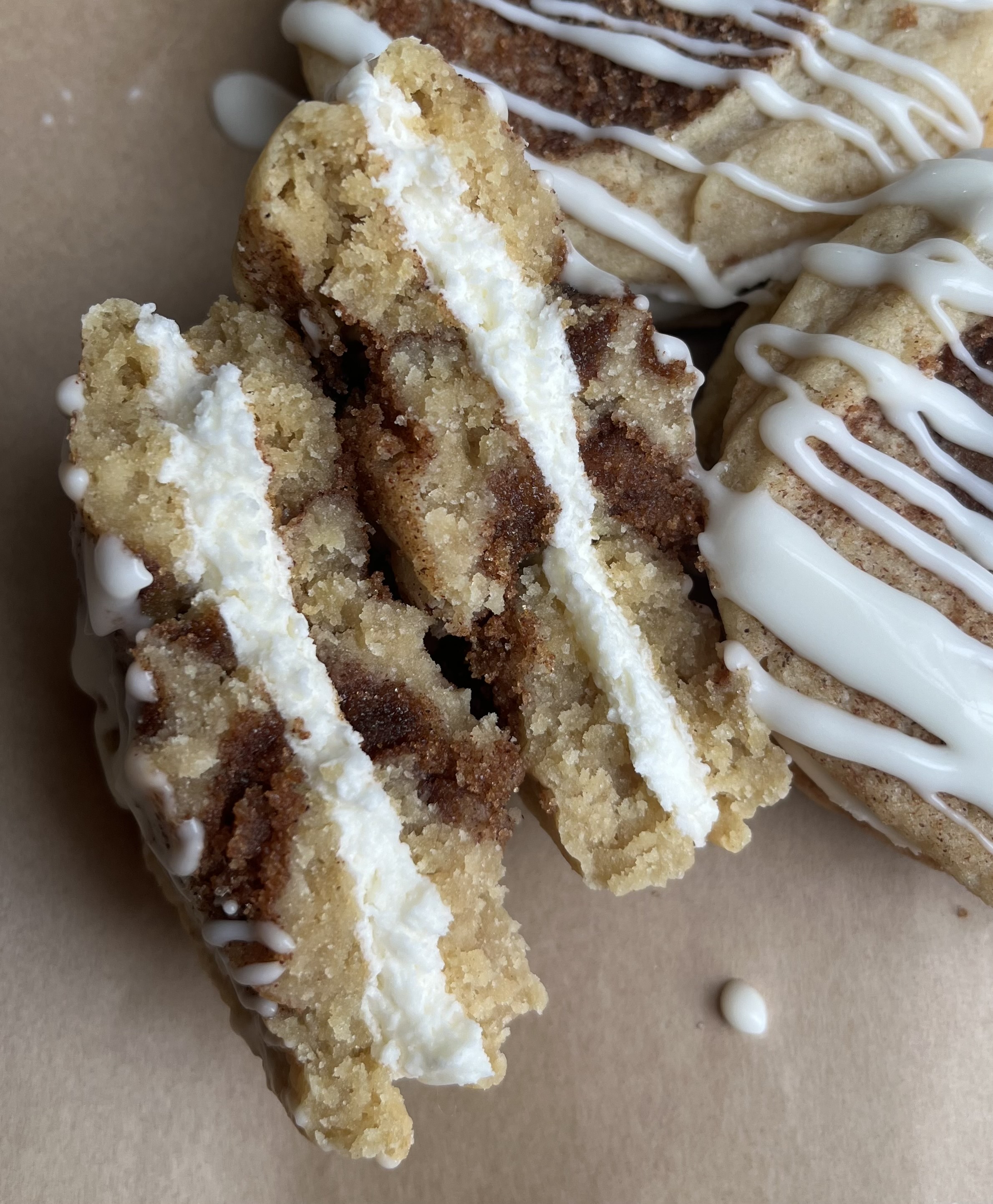Cinnamon Roll Sandwich Cookies with Cream Cheese Frosting