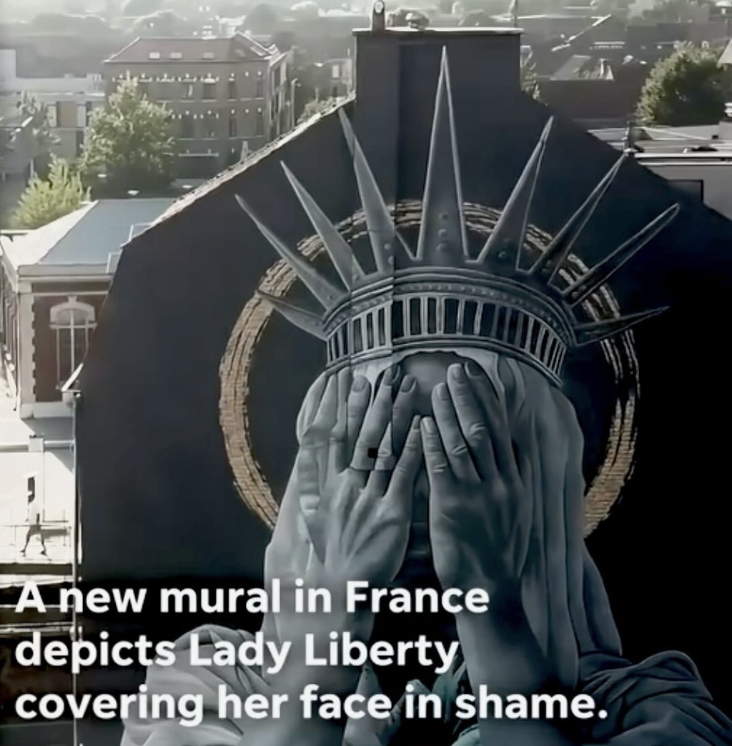 LetsGetIntoIt2025 on Substack: "A mural depicting the Statue of Liberty with her face in her ...