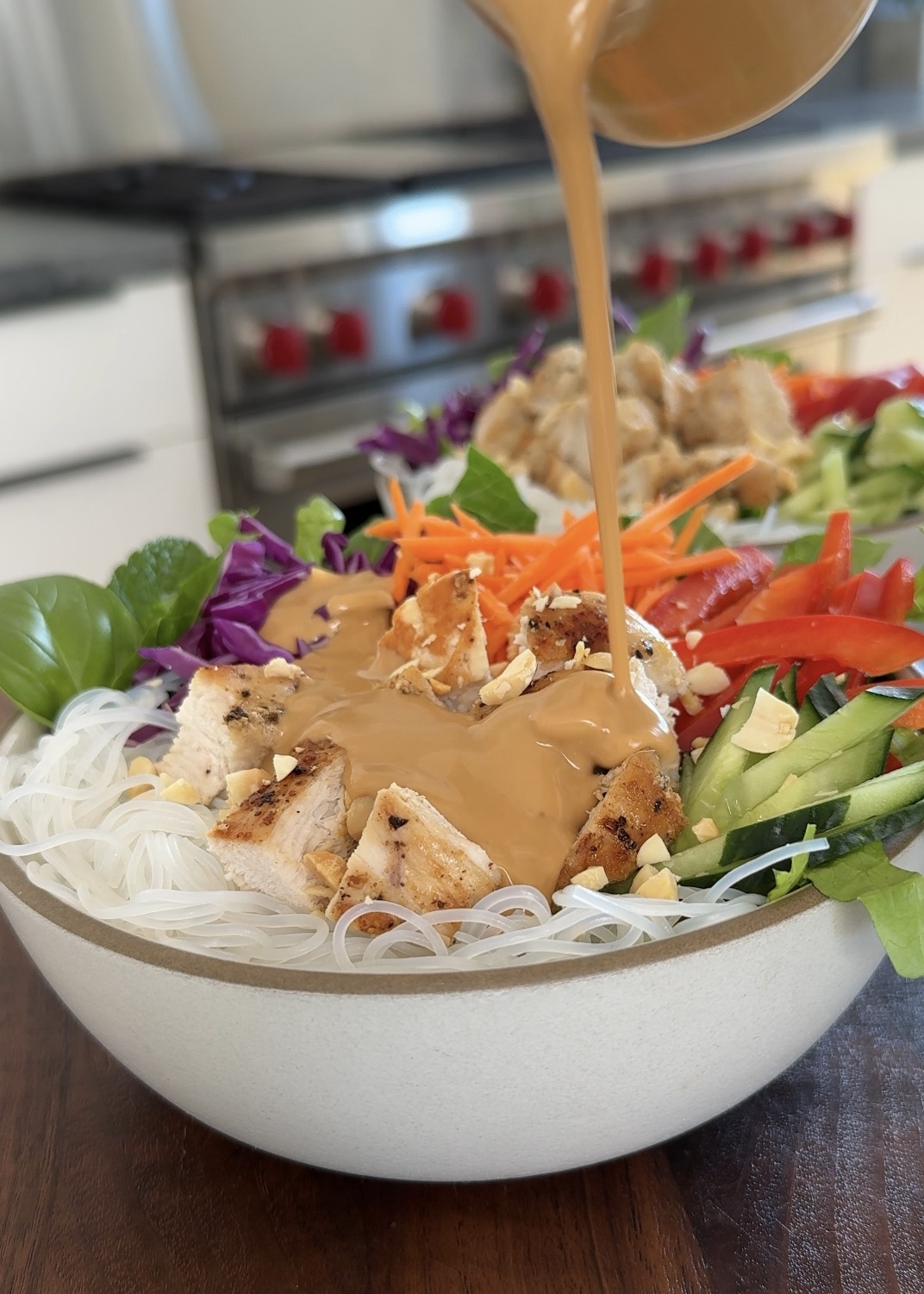 Peanut Chicken Spring Roll Bowls - by Maxine Sharf