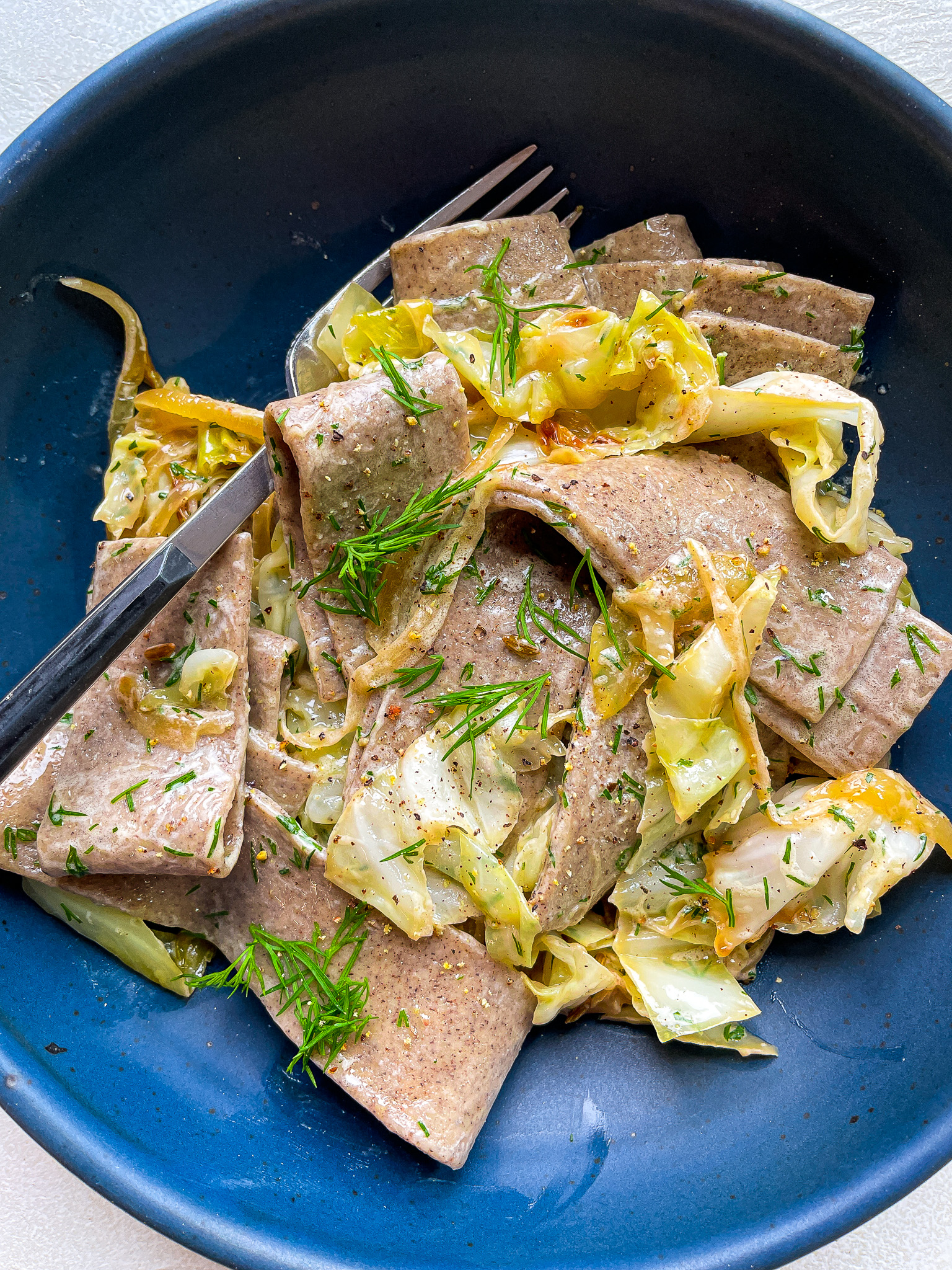 buckwheat pasta with buttery fried cabbage & dill