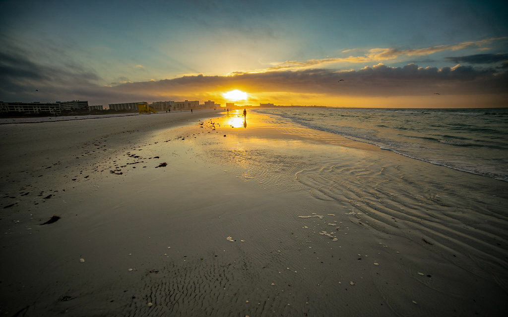 Beckett Johnson on Substack: "Coffee in hand. Bare feet in sand. Watching the sky argue with ...