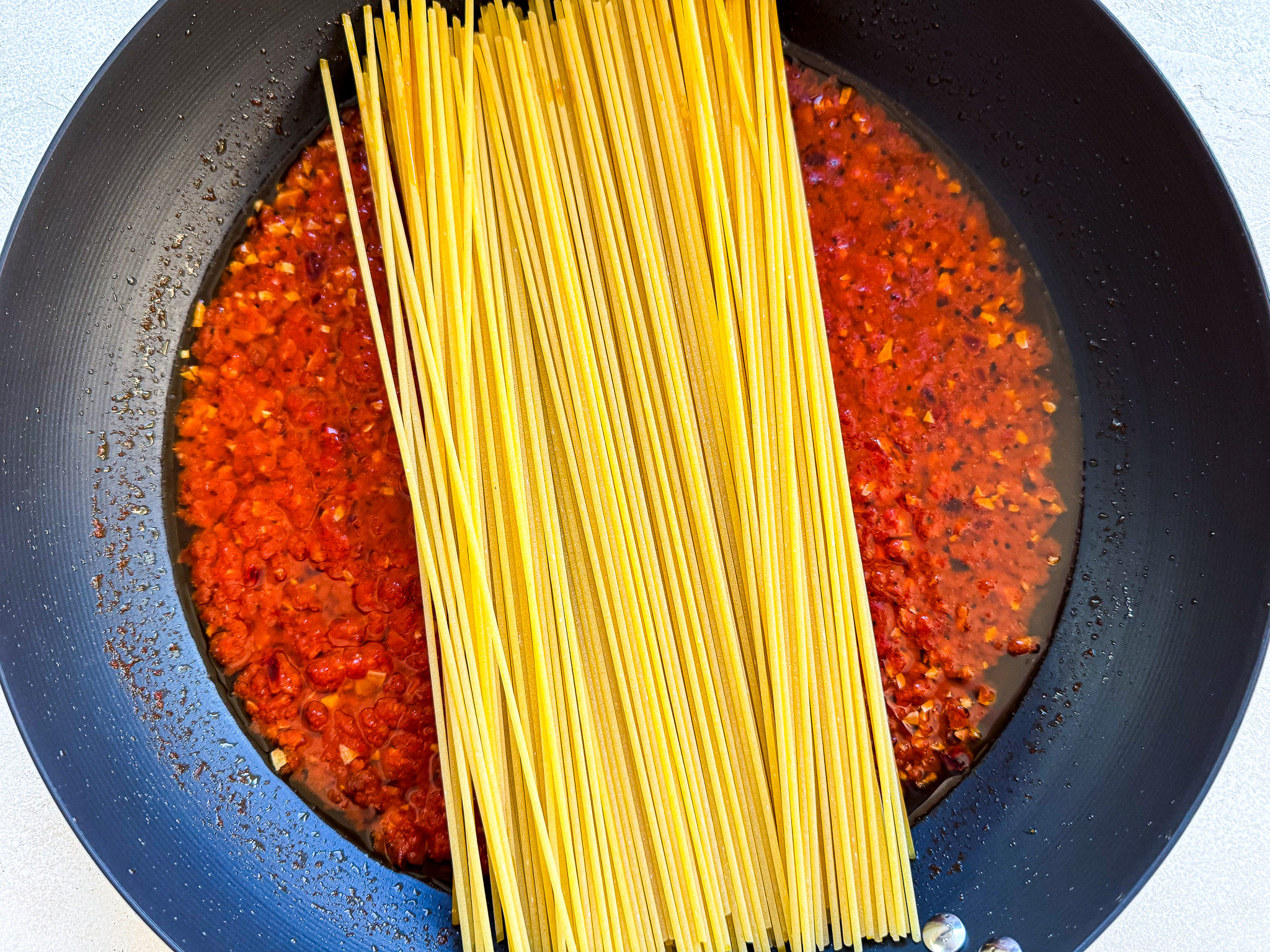 puglia's spicy, seared tomato spaghetti